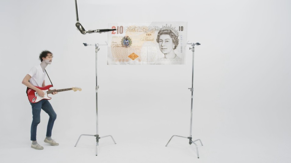 Video Clip Brilliantly Uses Forced Perspective To show Talking Money Bills