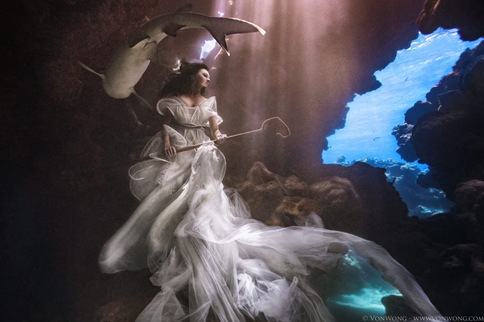 Von Wong Tied Down a Model And Photographed Her With Sharks