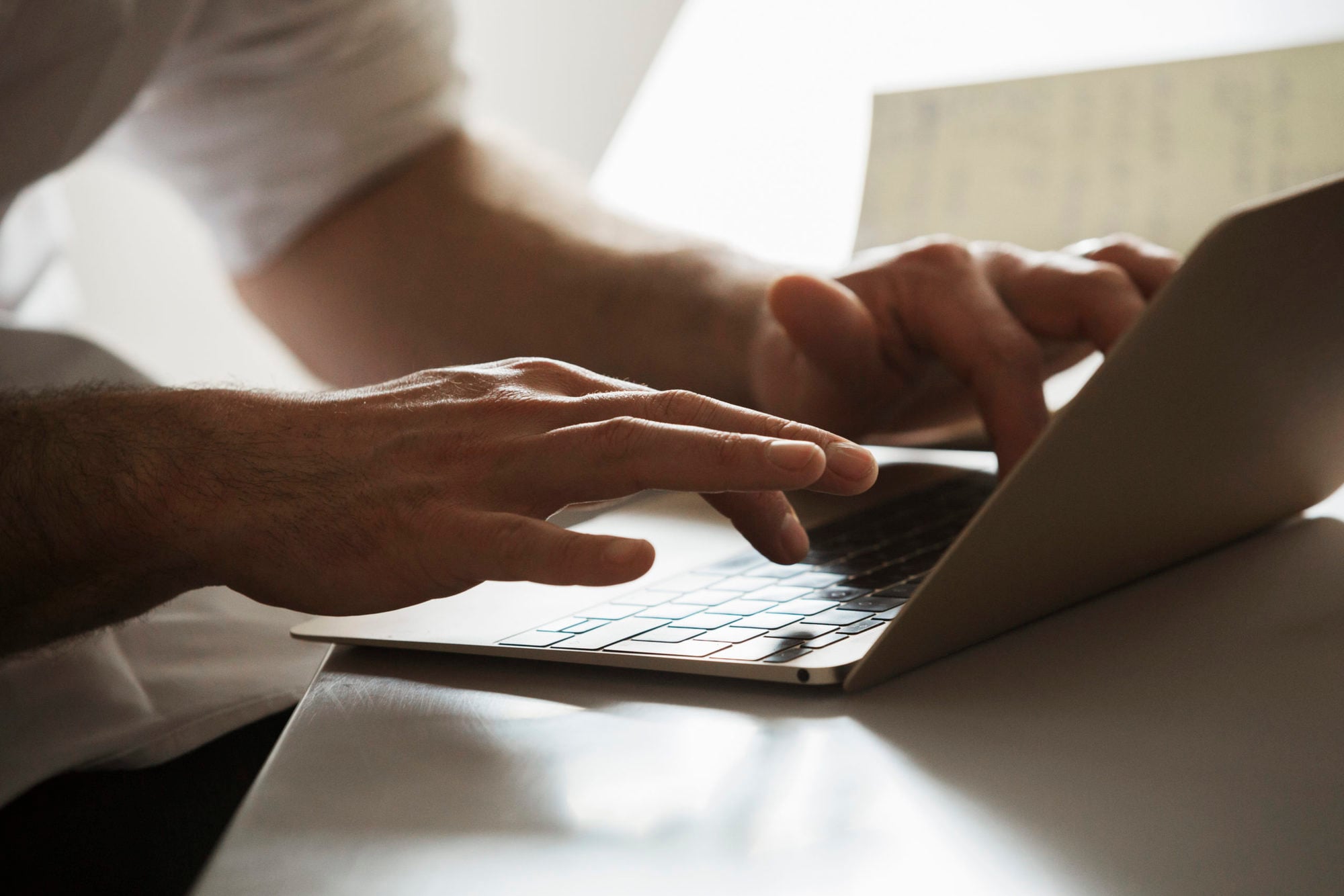Apple: Don't close your MacBook if you have a camera cover - it will ...