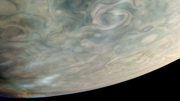 Juno mission captures beautiful swirling clouds over Jupiter